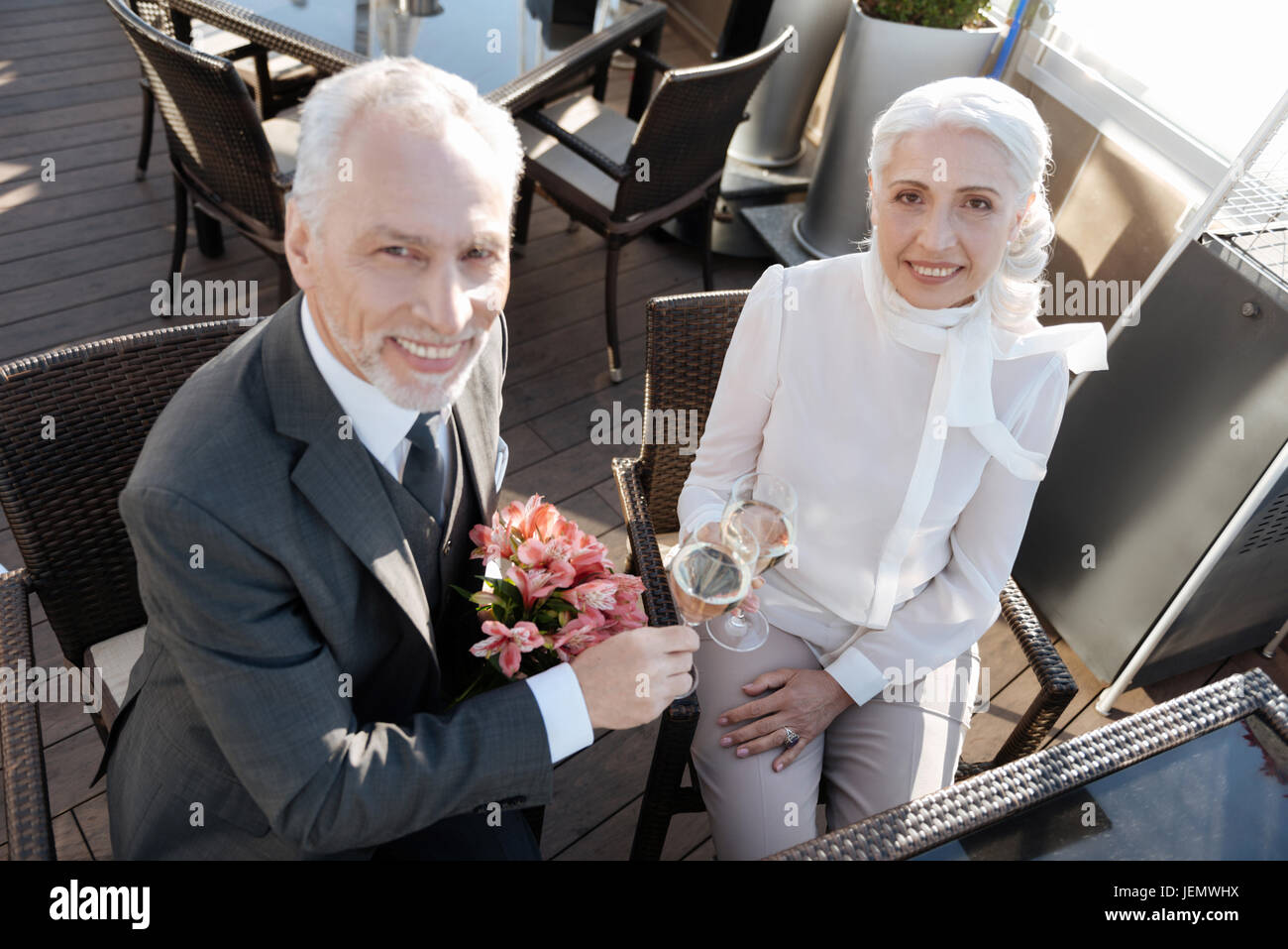 Handsome man in costume expressing positivity Stock Photo - Alamy