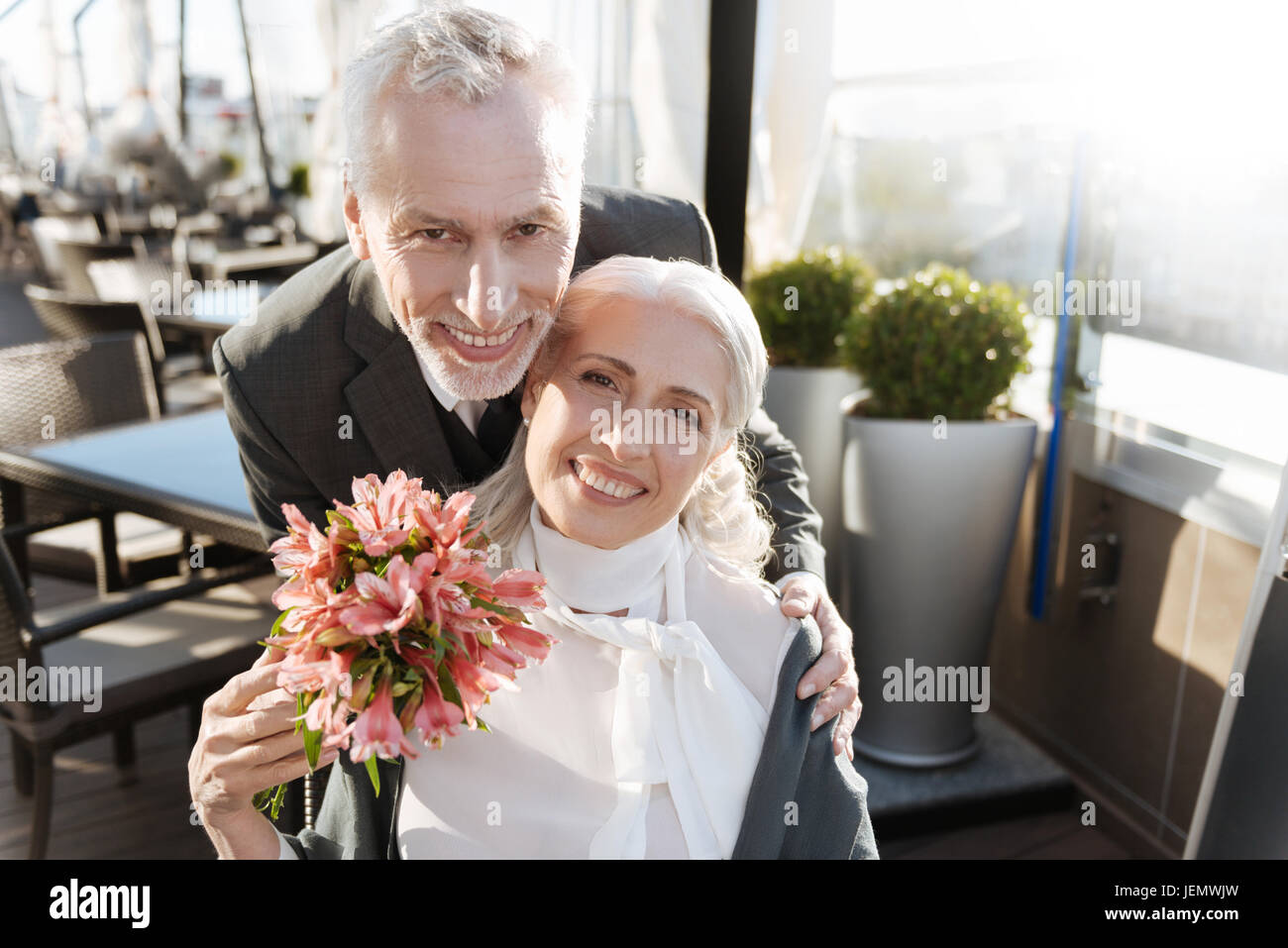 Positive delighted blonde smiling from happiness Stock Photo - Alamy