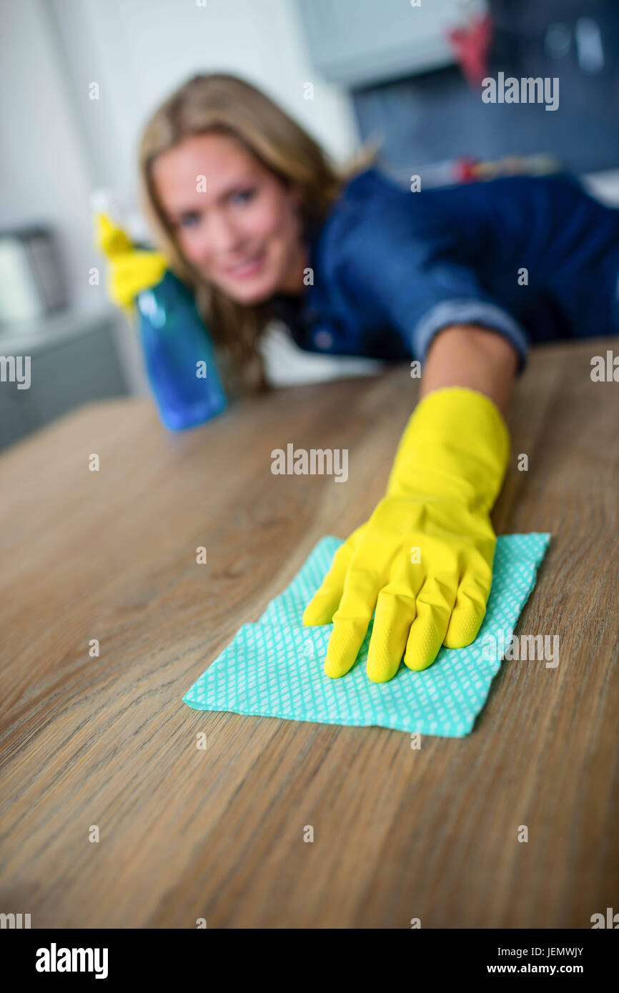 Cute couple cleaning up Stock Photo - Alamy