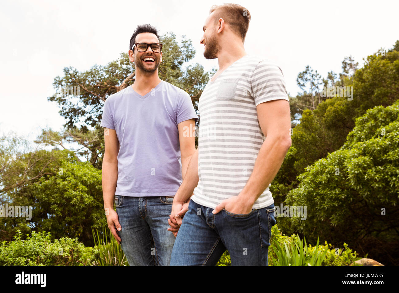 Happy gay couple looking other hi-res stock photography and images - Alamy