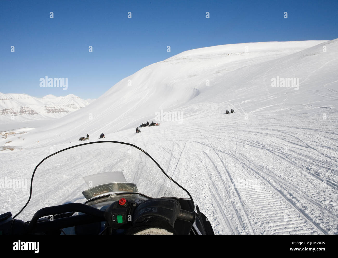 Snowmobile in winter landscape Stock Photo - Alamy