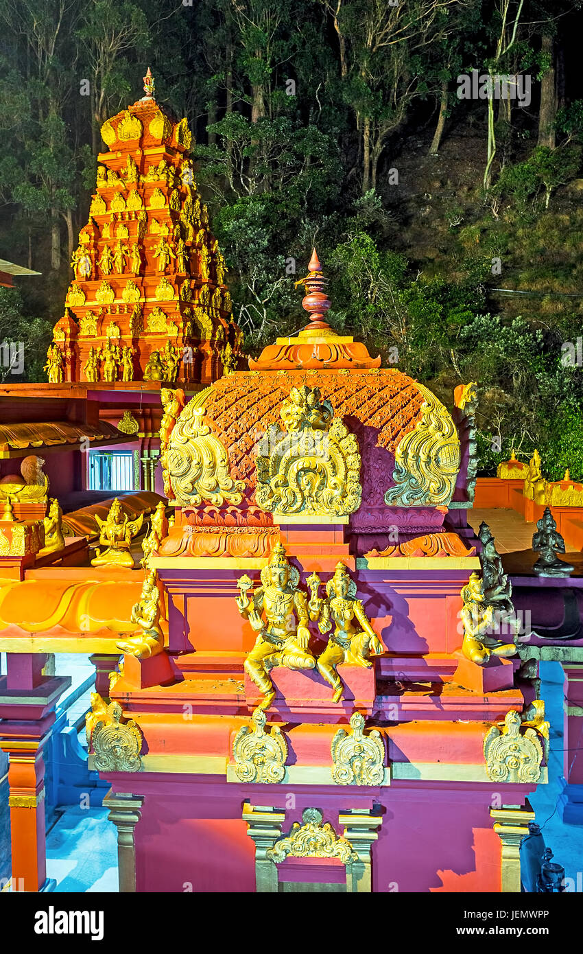 The vimanam and shikhara towers of Seetha Amman Hindu Temple in evening ...