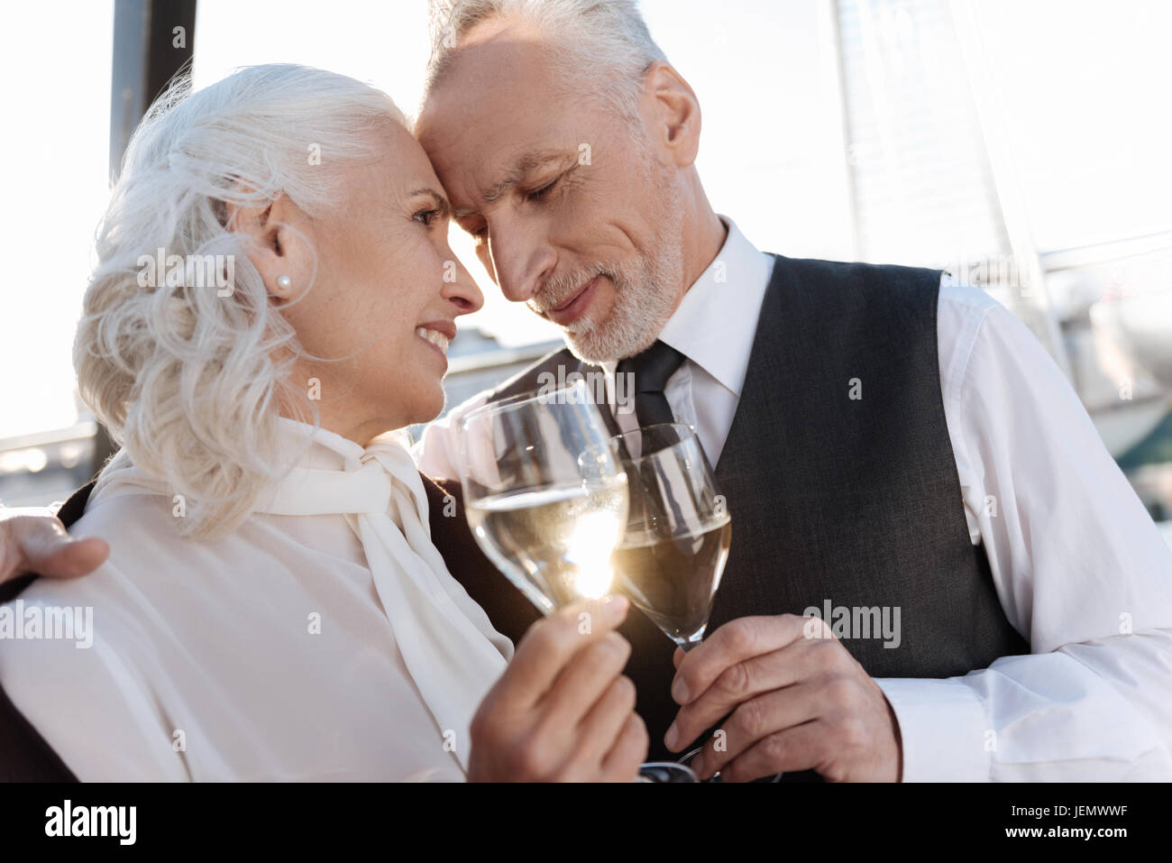 Tender man feeling happiness with this woman Stock Photo - Alamy