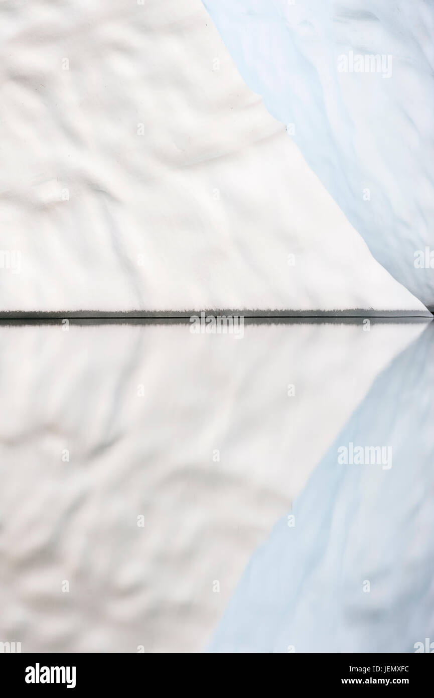 Ice reflecting in water Stock Photo - Alamy