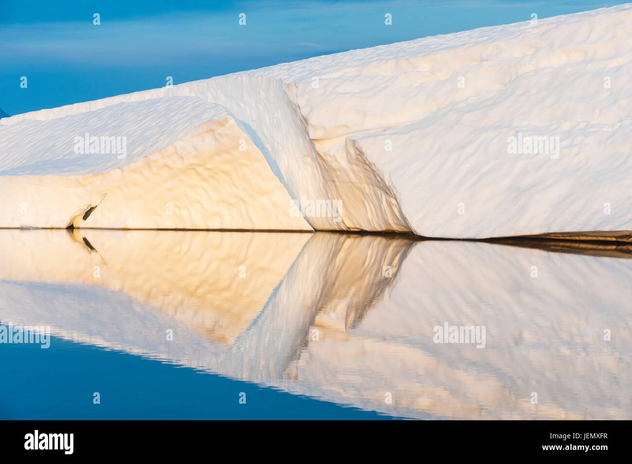 Ice reflecting in water Stock Photo - Alamy