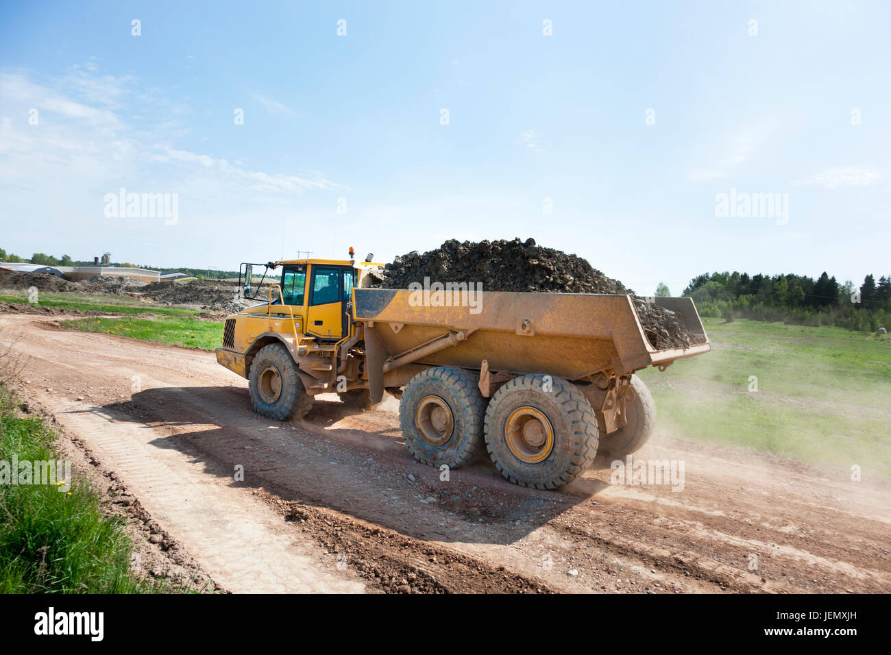 Loaded dumper truck Stock Photo - Alamy
