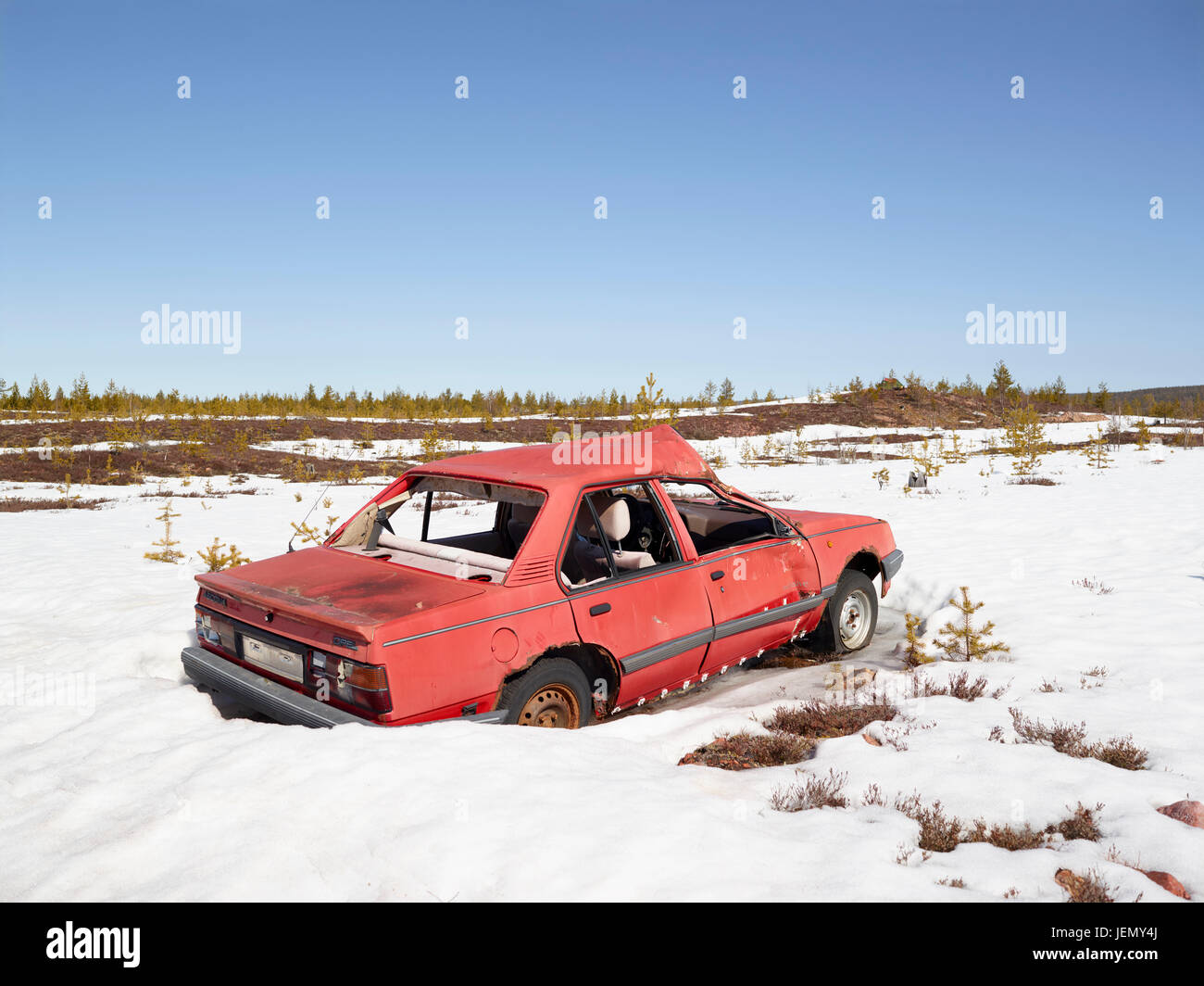 Red car over snow hi-res stock photography and images - Alamy