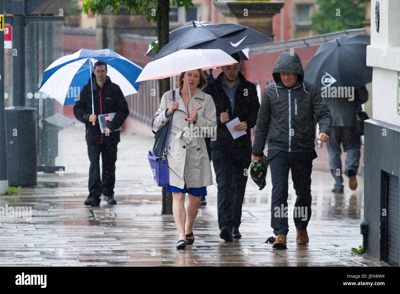 Preston, Lancashire. 27th June 2017. UK Weather. Commuters faced heavy ...