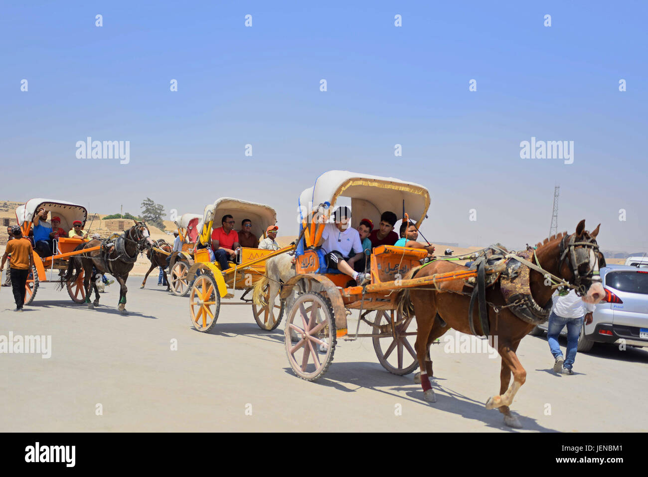 Cairo, Egypt. 27th June, 2017. Egyptians ride horse carts in front of ...