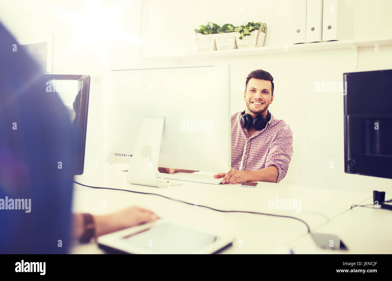 creative man with headphones and computer Stock Photo - Alamy