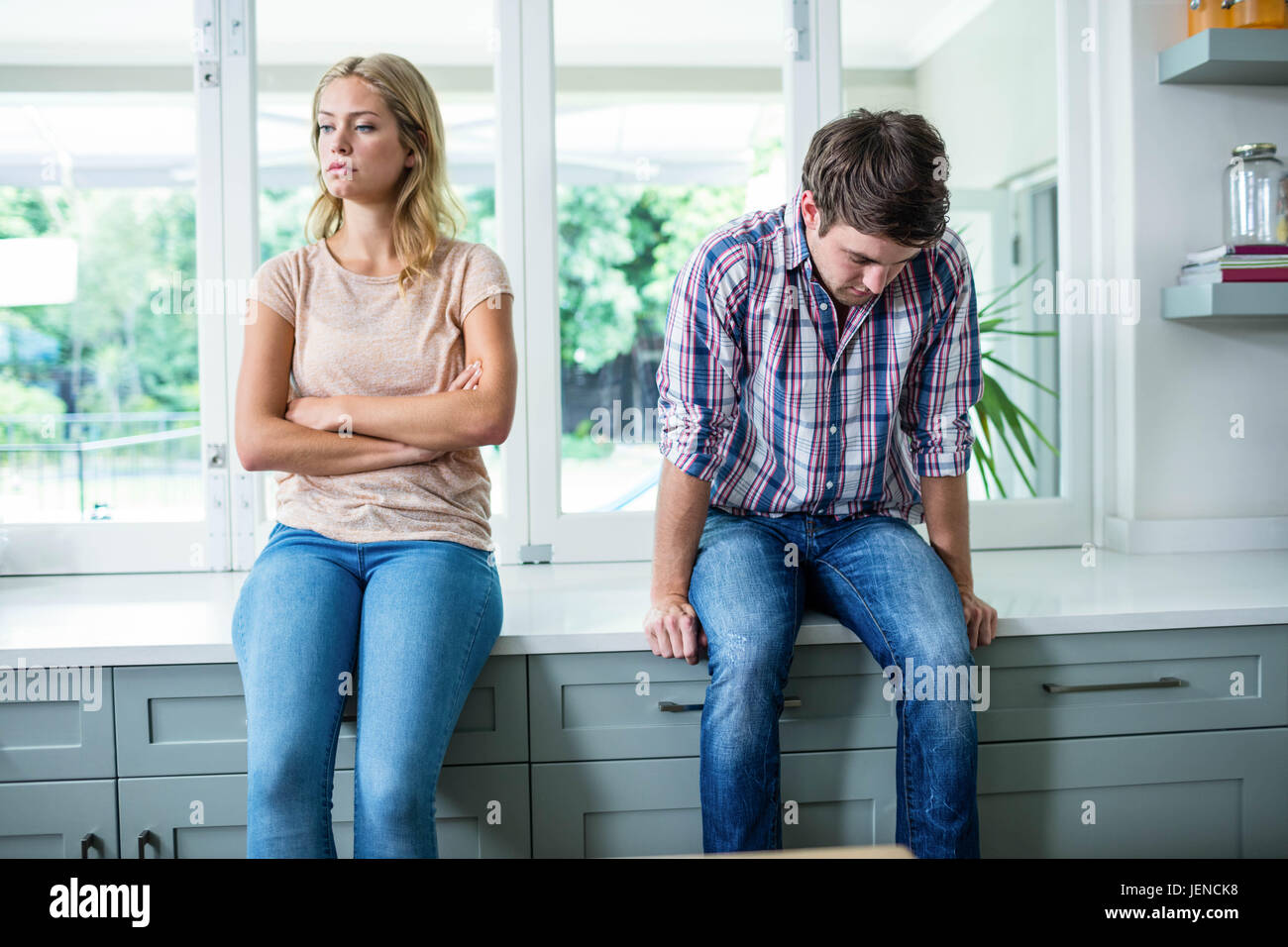 Annoyed couple ignoring each other Stock Photo - Alamy
