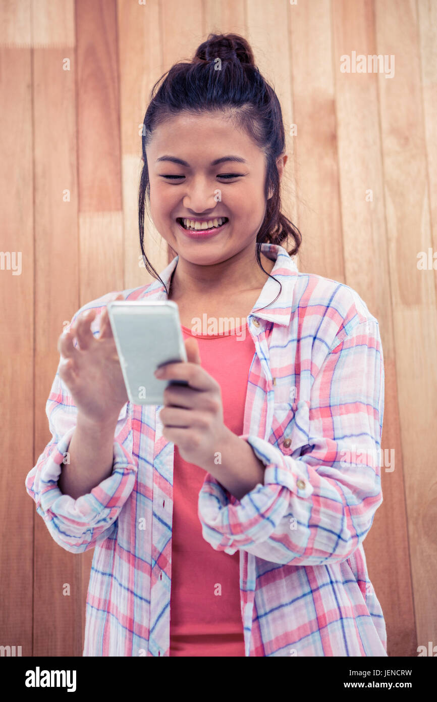 Happy Asian woman using smartphone Stock Photo - Alamy