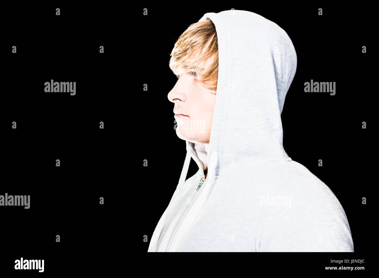 Side view of serious man looking away Stock Photo - Alamy