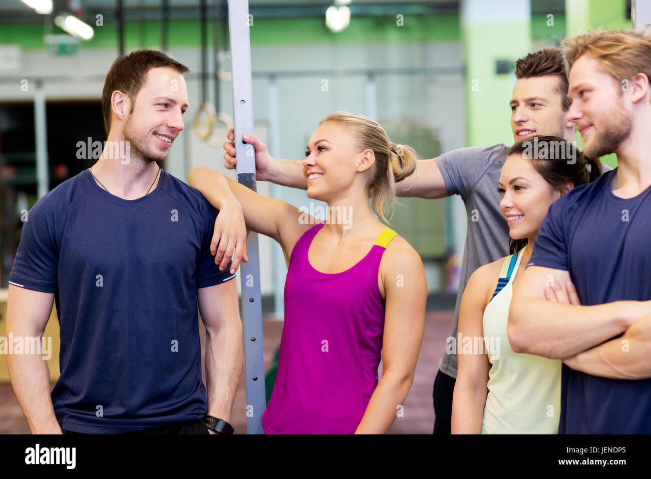 group of happy friends in gym Stock Photo - Alamy