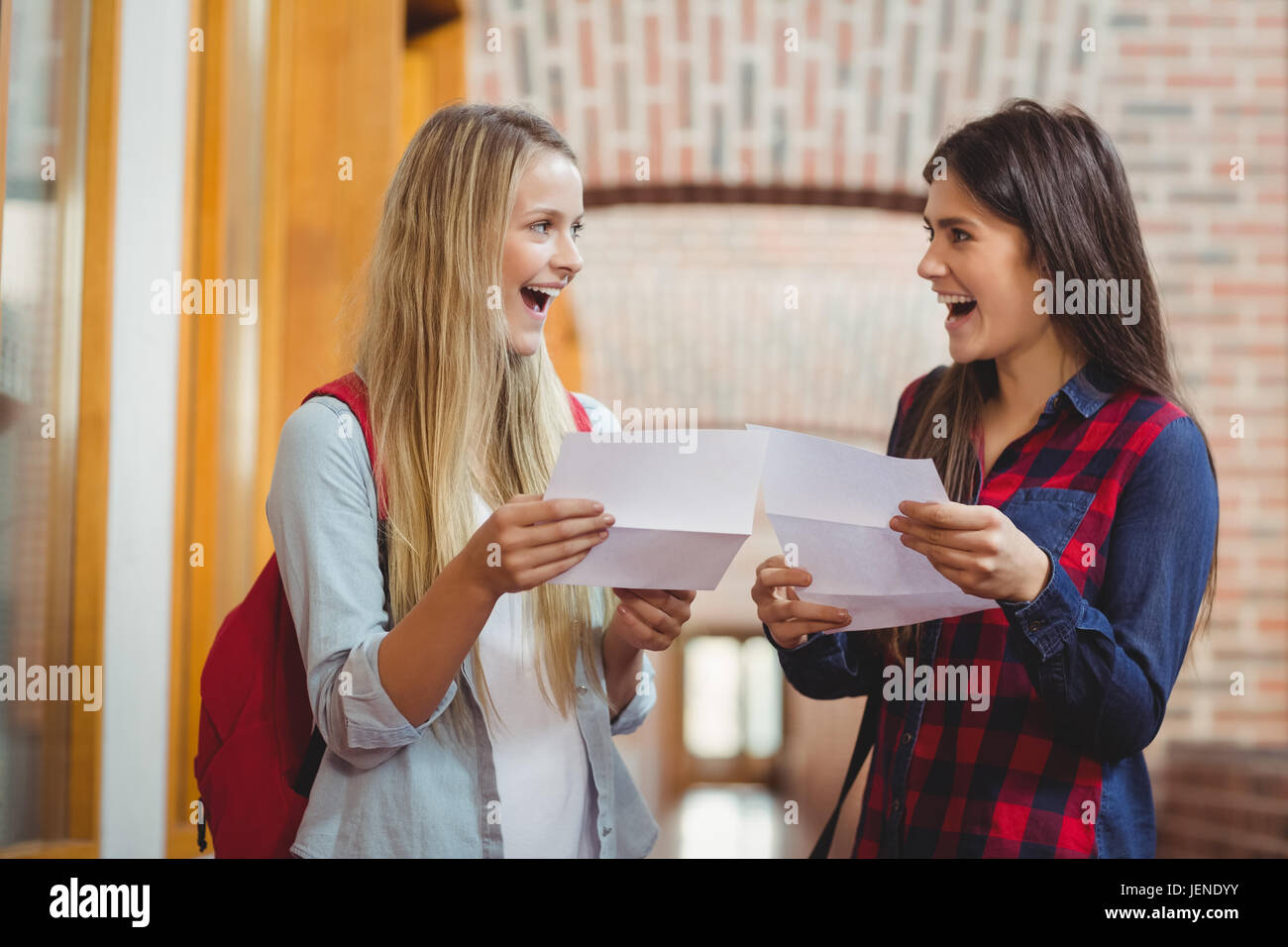 Education smiling holding results hi-res stock photography and images ...