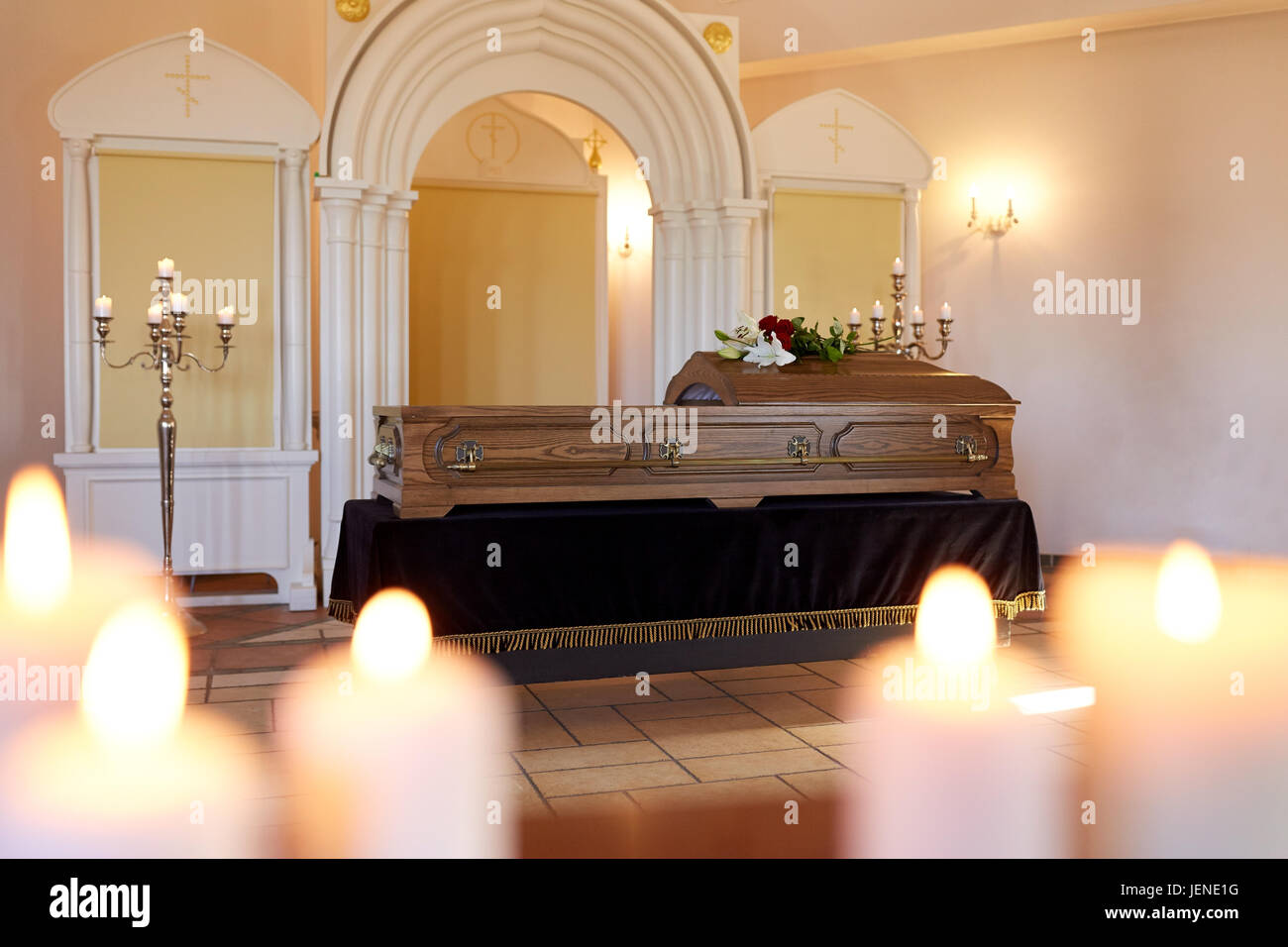 burning candles and coffin in church at funeral Stock Photo - Alamy
