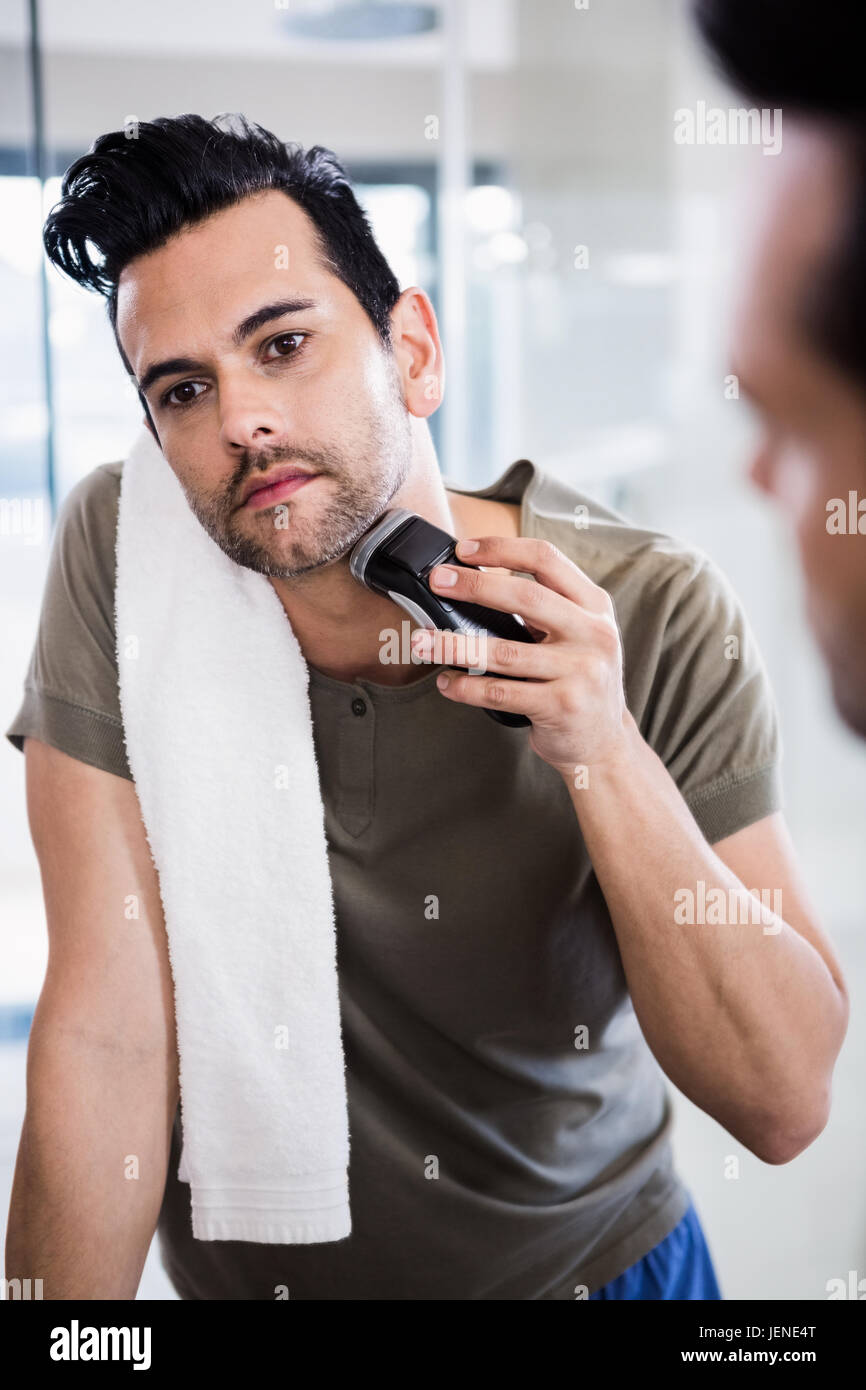 Man using bathroom towel hi-res stock photography and images - Alamy