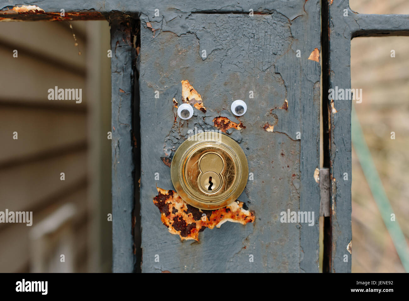 silly face with lock and googly eyes Stock Photo - Alamy