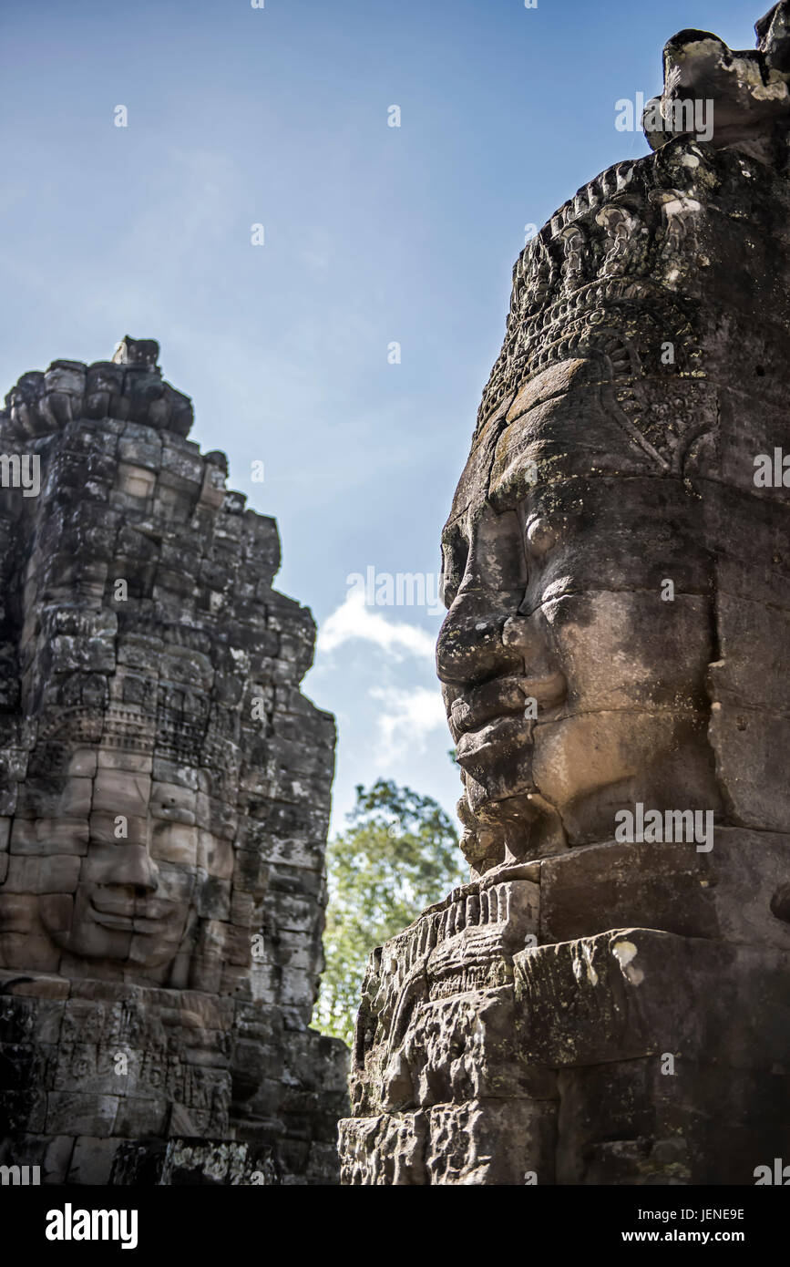 Sculpted stone heads at Bayon Temple, Angkor Wat, Siem Reap, Cambodia ...