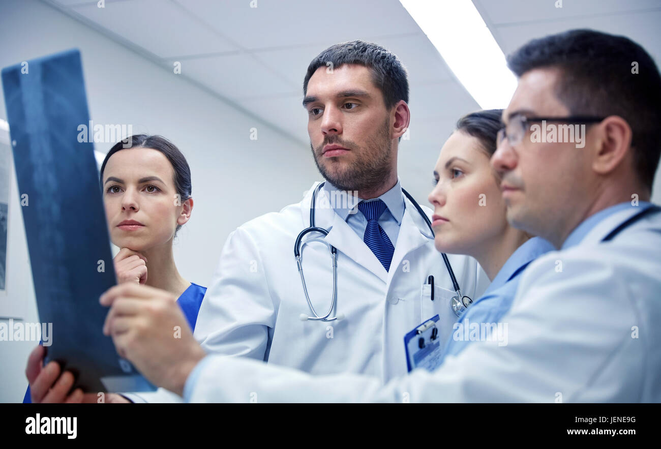 group of doctors looking at x-ray scan image Stock Photo - Alamy
