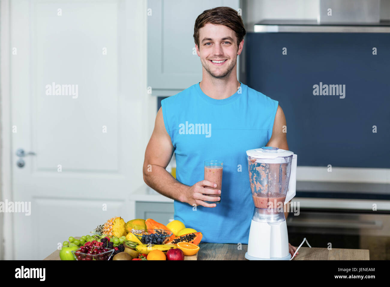 Healthy man preparing a smoothie Stock Photo - Alamy