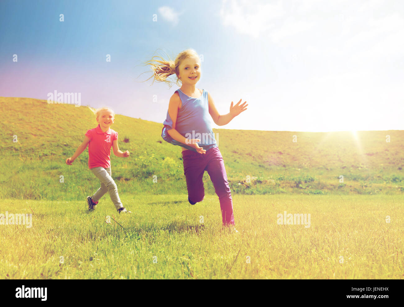 group of happy kids running outdoors Stock Photo - Alamy