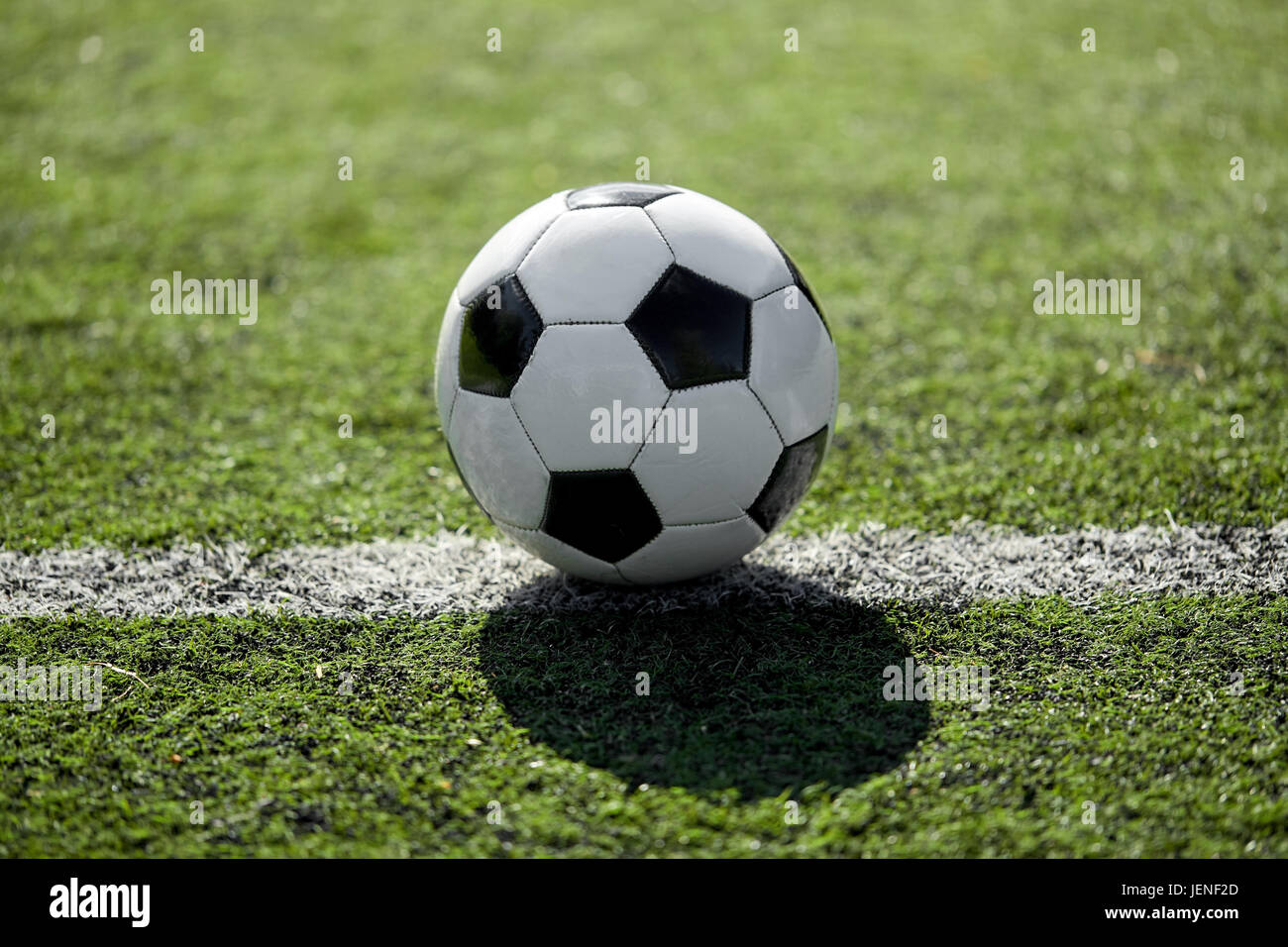 soccer ball on football field marking line Stock Photo - Alamy