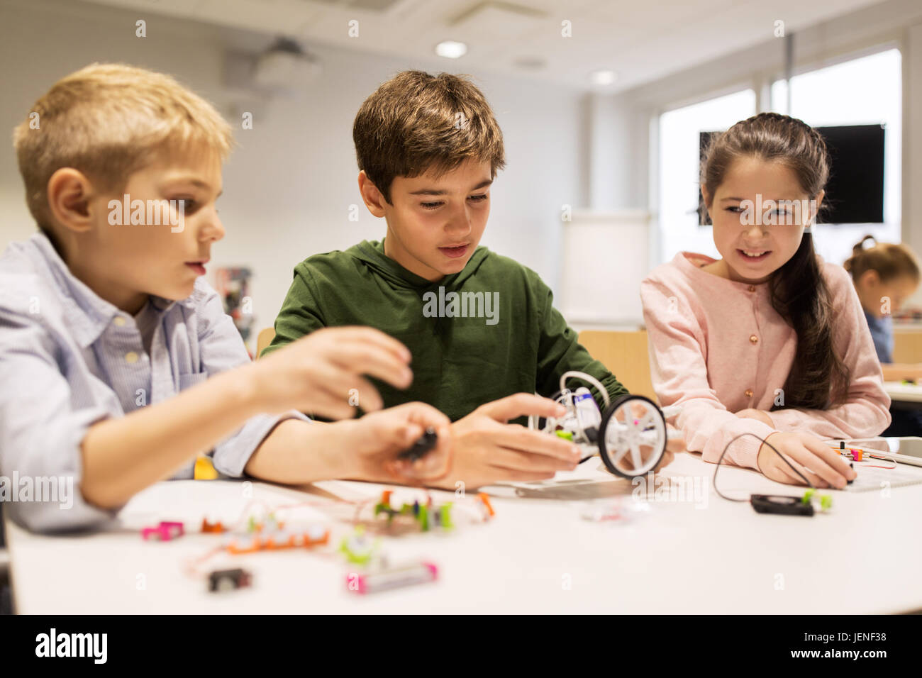 happy children building robots at robotics school Stock Photo - Alamy