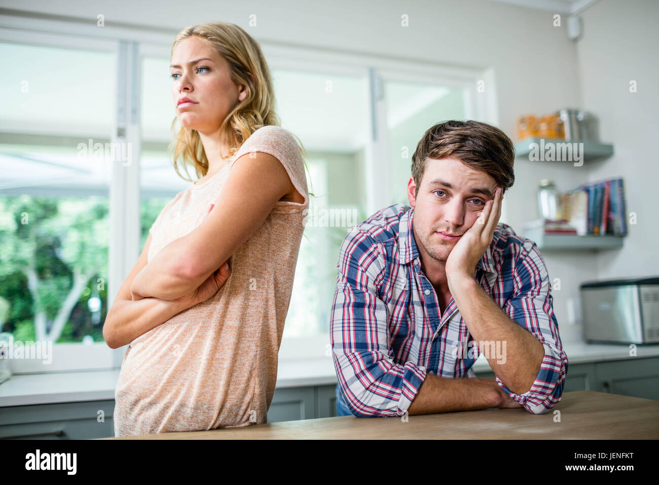 Annoyed couple ignoring each other Stock Photo - Alamy
