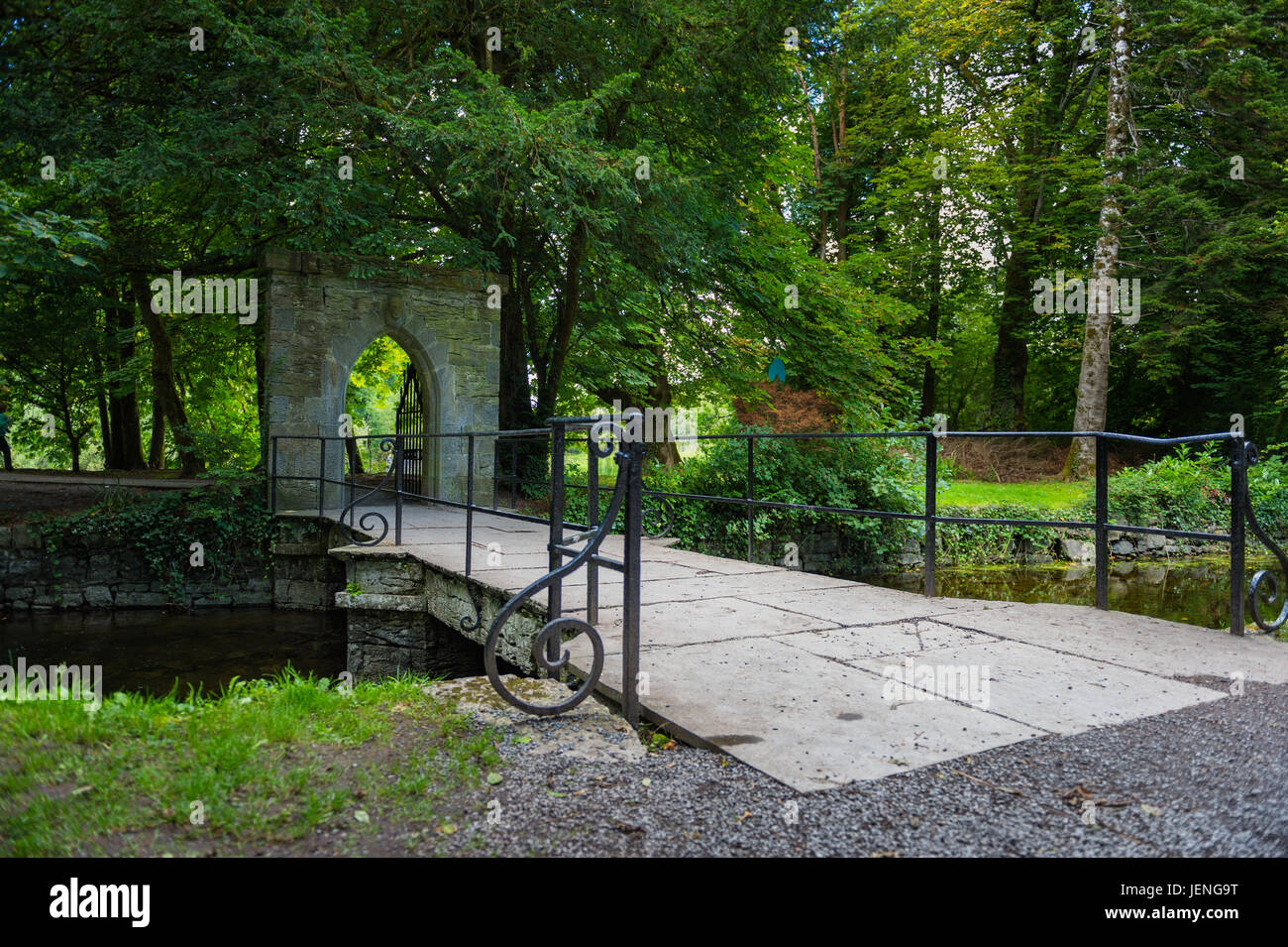 Footbridge at entrance to forest park at Cong, Co. Mayo Stock Photo - Alamy