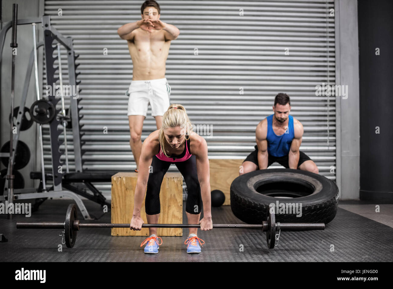 Fit people doing exercises Stock Photo - Alamy