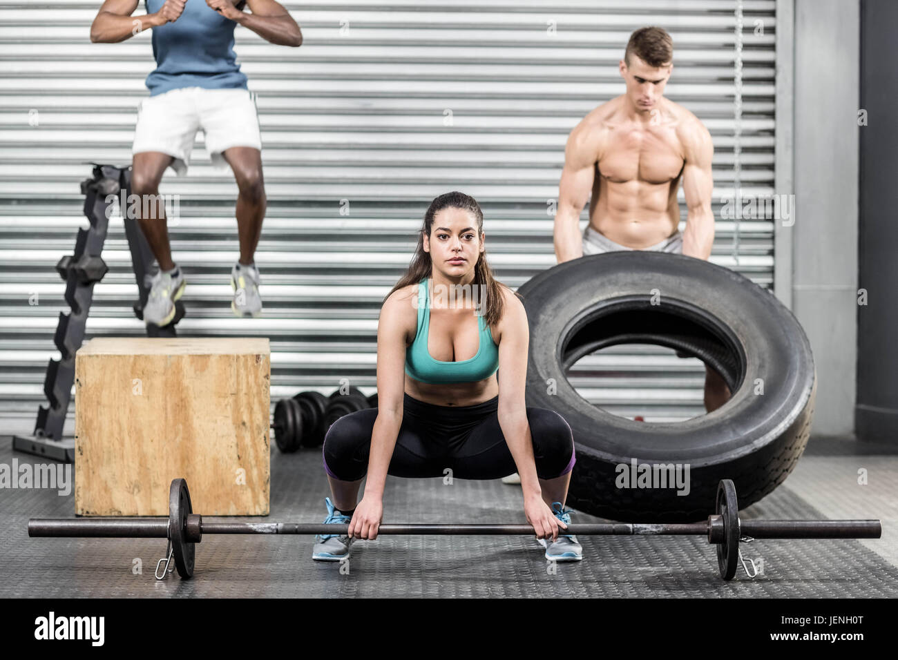 Fit people exercising together Stock Photo - Alamy