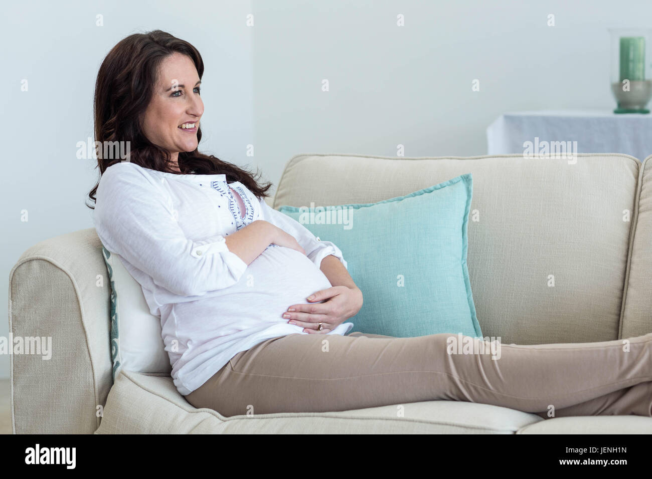 Hand resting on stomach hi-res stock photography and images - Alamy