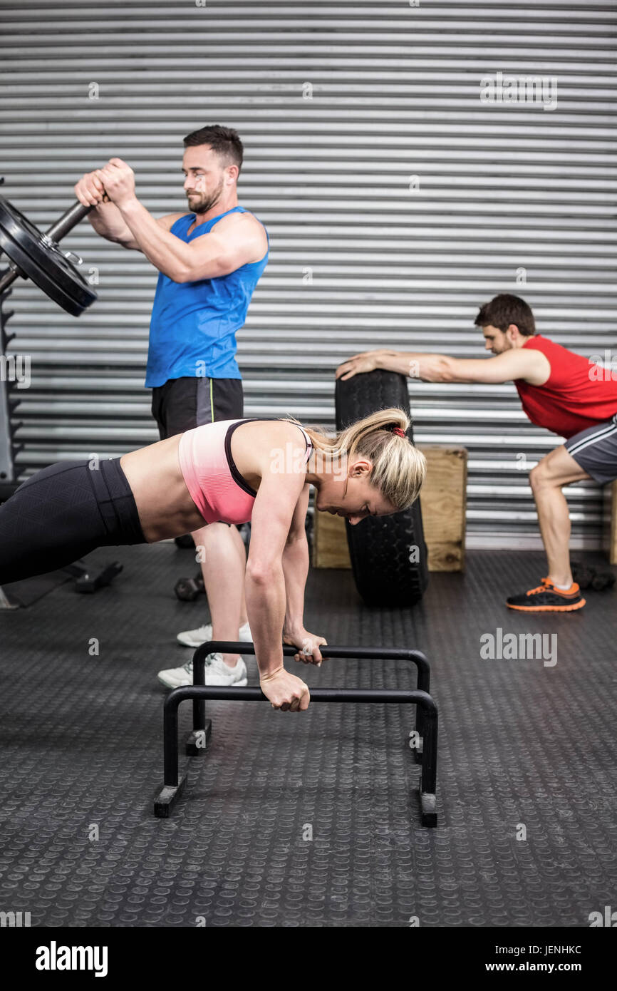 Fit people doing exercises Stock Photo - Alamy