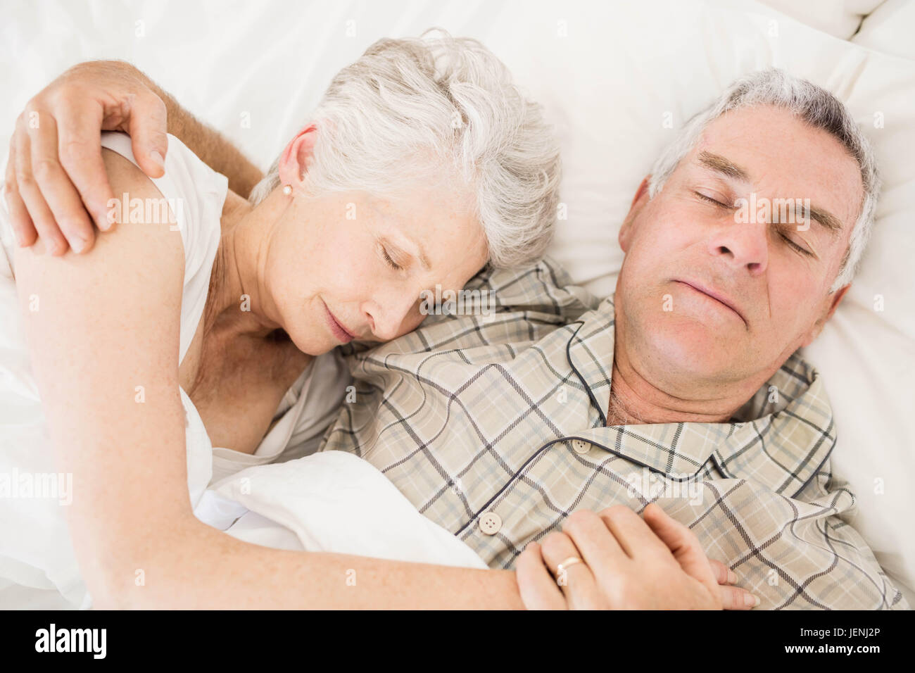 Peaceful senior couple sleeping Stock Photo - Alamy