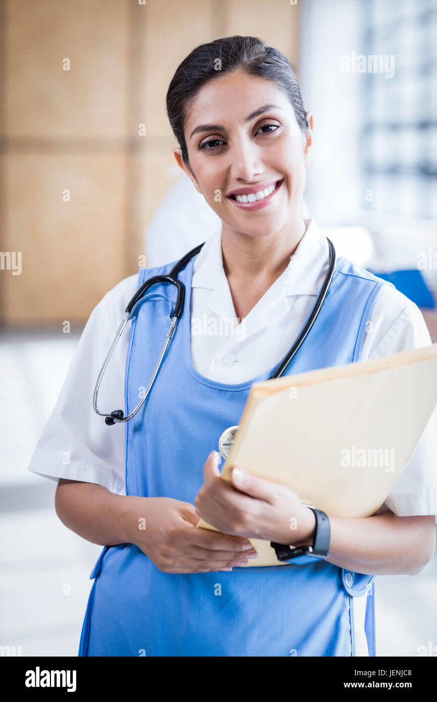 Nurse smiling at the camera Stock Photo - Alamy