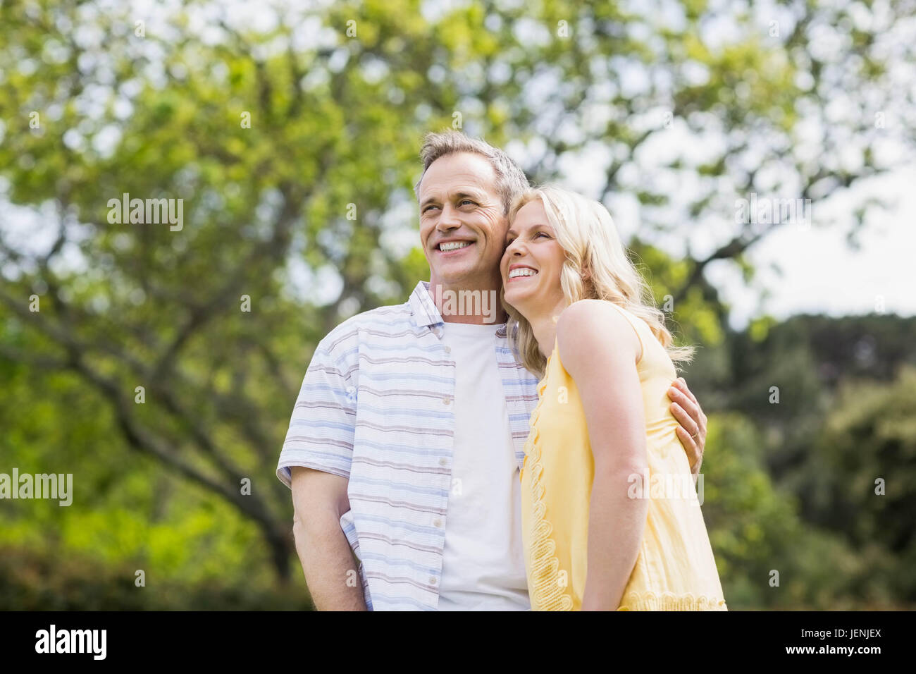 Happy couple hugging Stock Photo - Alamy