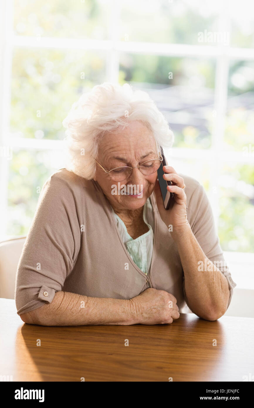 Elderly woman phone calling Stock Photo - Alamy