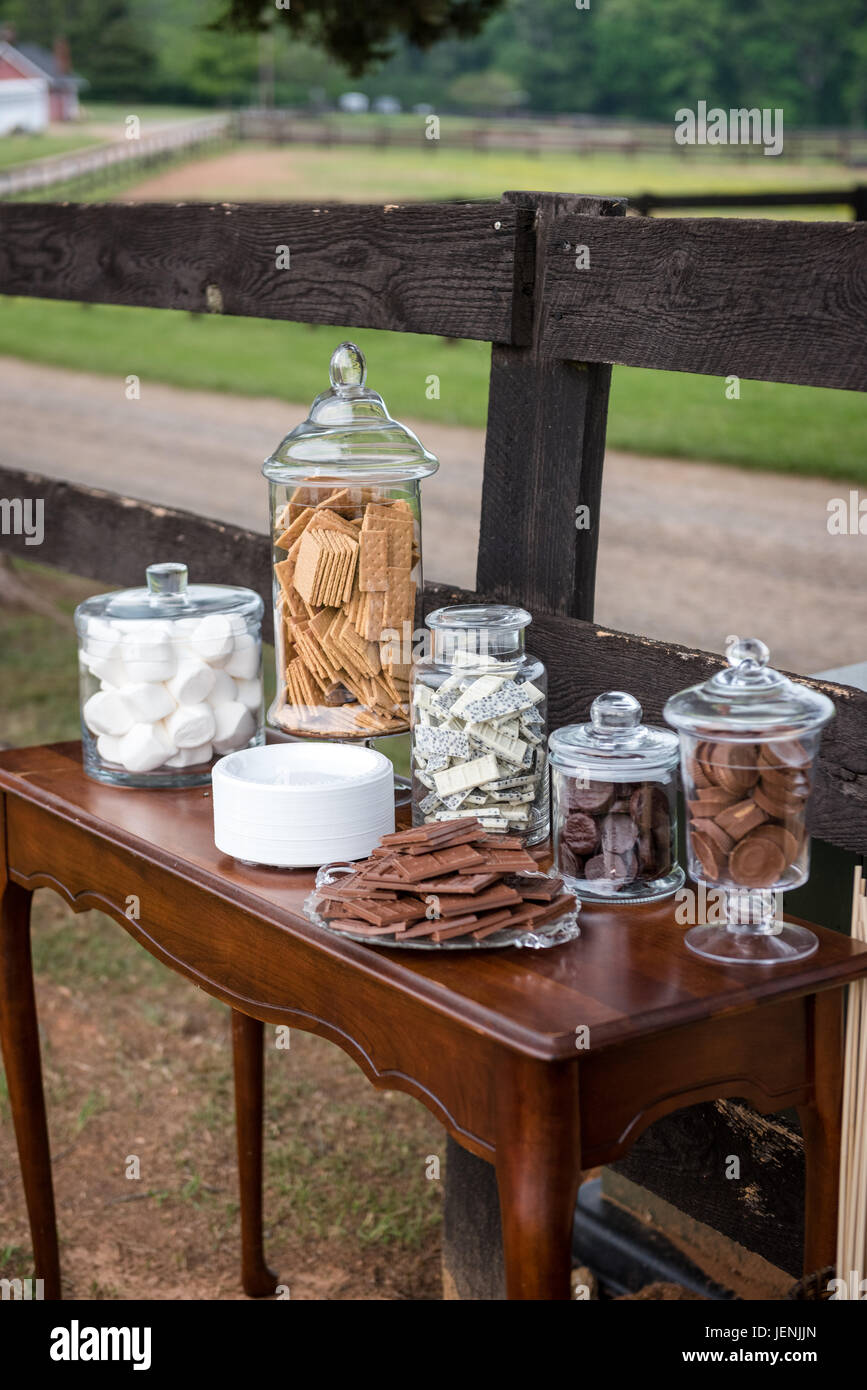 Dessert smore table pictured at a countryside wedding celebration at ...