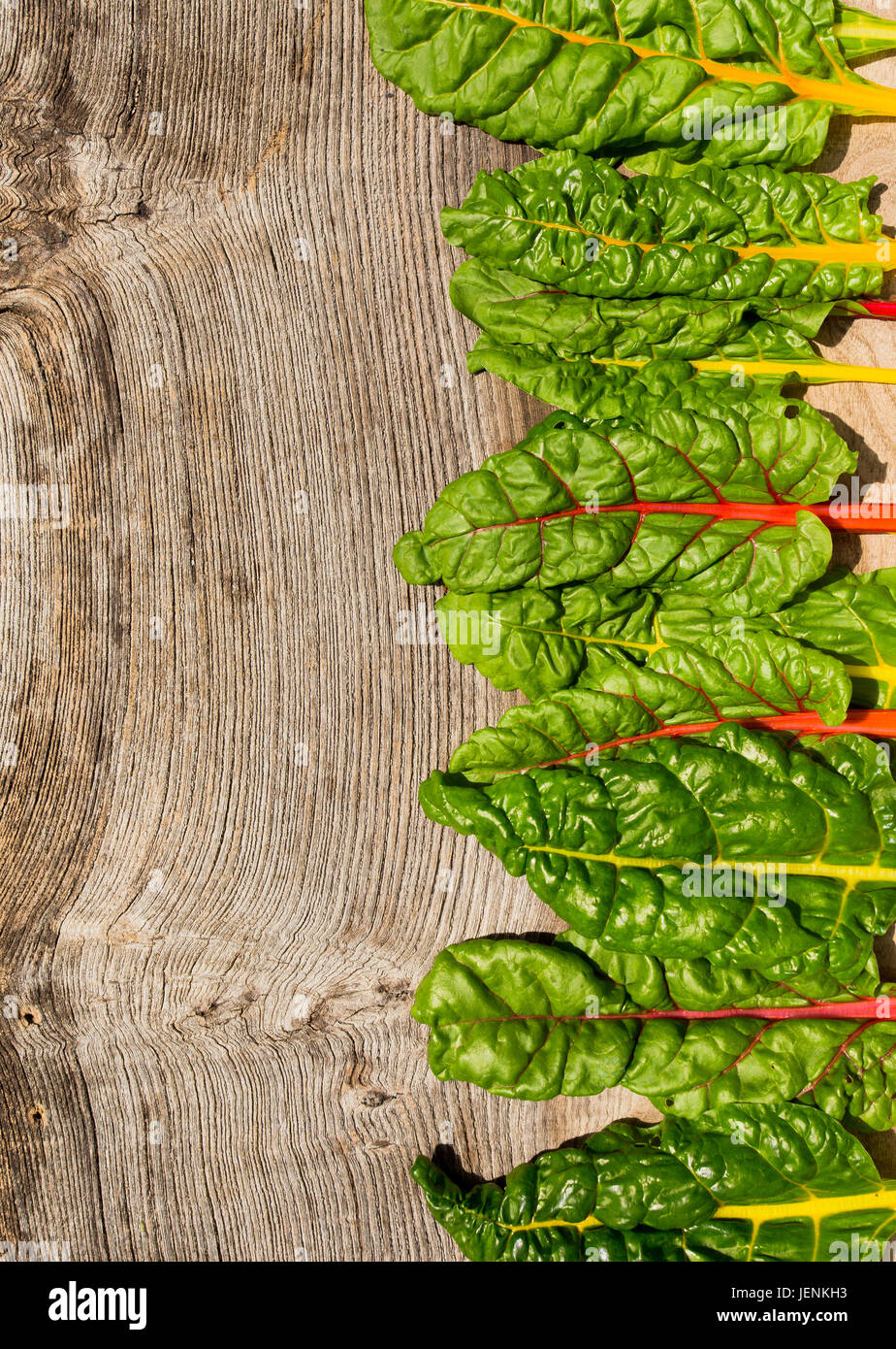 Flat lay rainbow swiss chard healthy diet recipes mock up wood ...