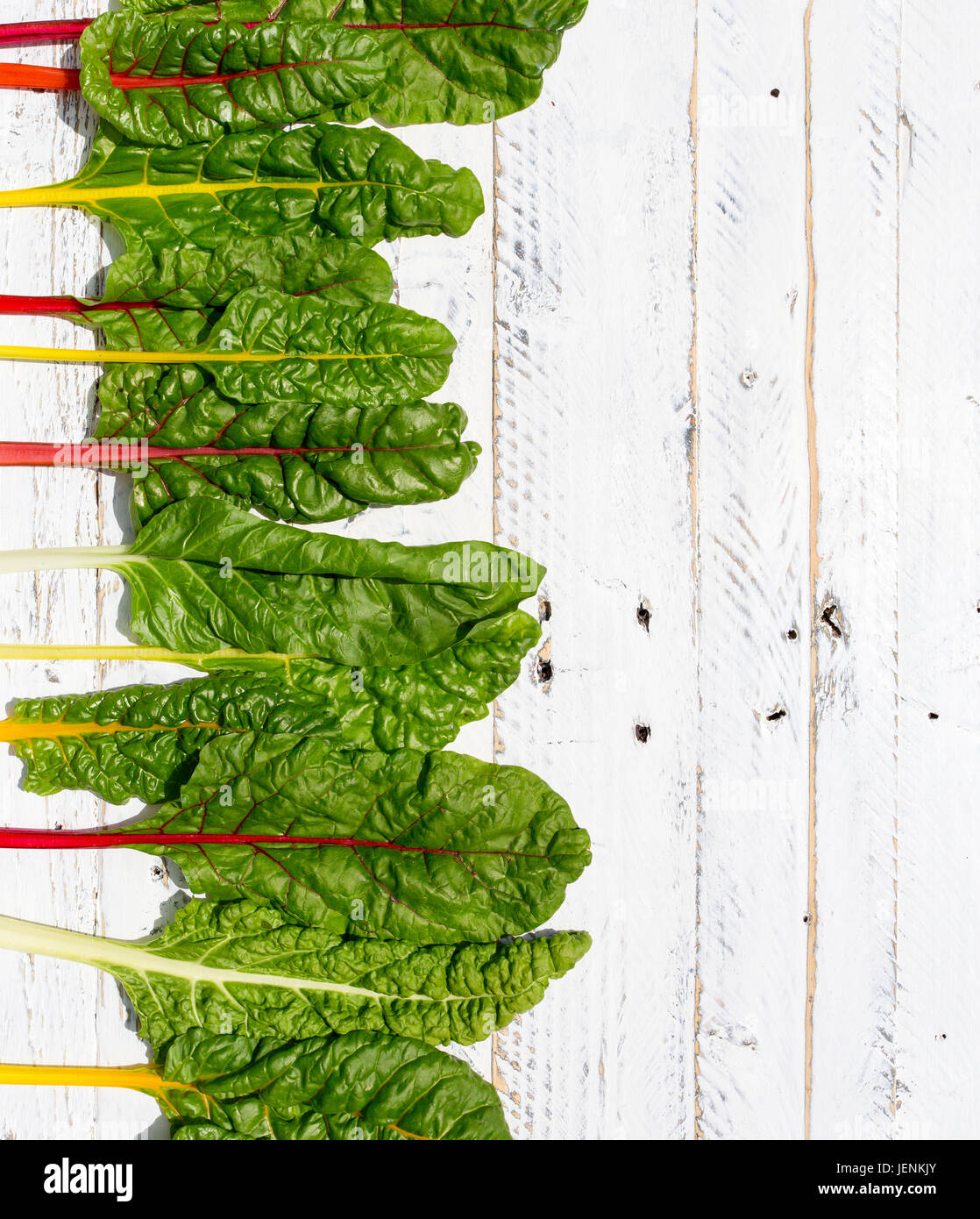 Flat lay rainbow swiss chard healthy diet recipes mock up white wood ...