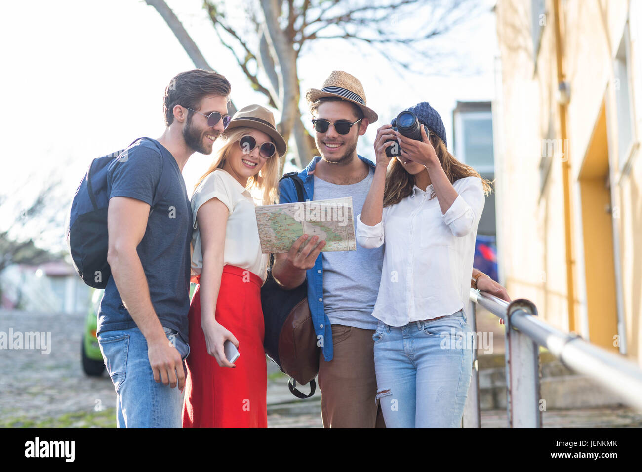 Woman taking pictures of friends hi-res stock photography and images ...
