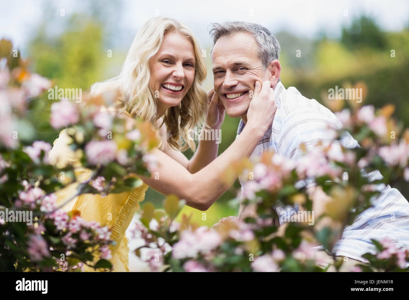 Happy couple hugging Stock Photo - Alamy