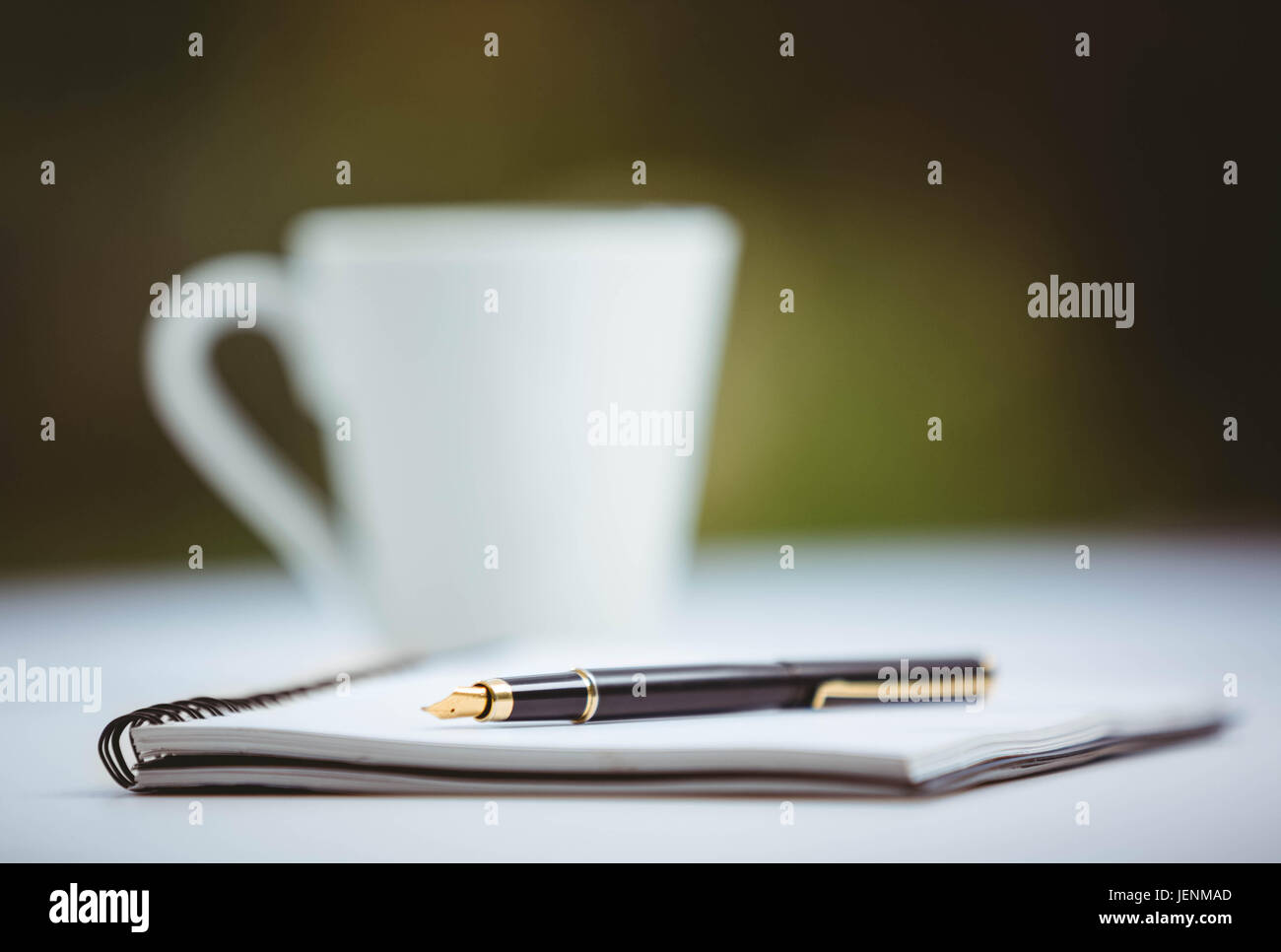 Overhead of notebook with pen and coffee Stock Photo - Alamy