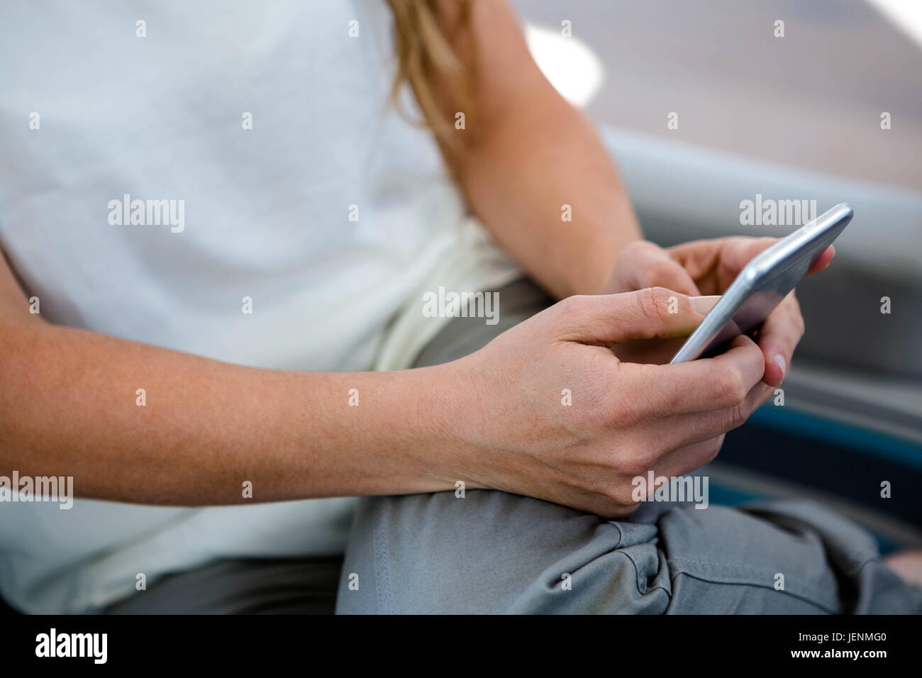 female hands typing on a mobile phone Stock Photo - Alamy