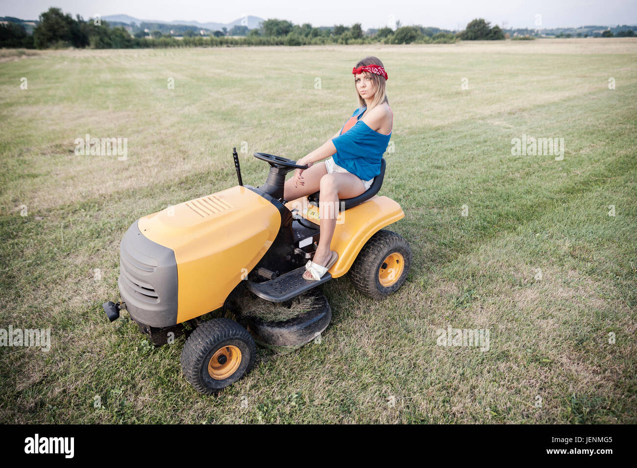 Lawn mower girl hi-res stock photography and images - Alamy