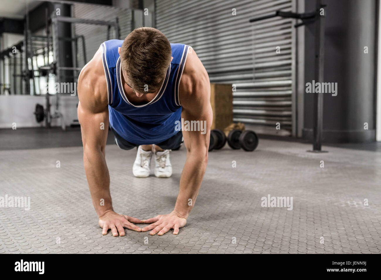Muscular man doing push up Stock Photo - Alamy