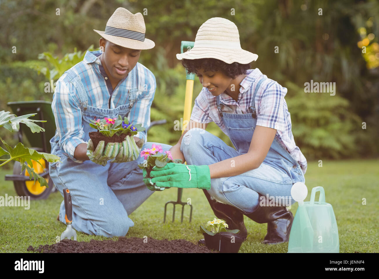 Happy couple in the garden Stock Photo - Alamy