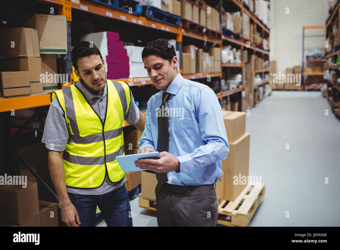 Worker using tablet pc high hi-res stock photography and images - Alamy