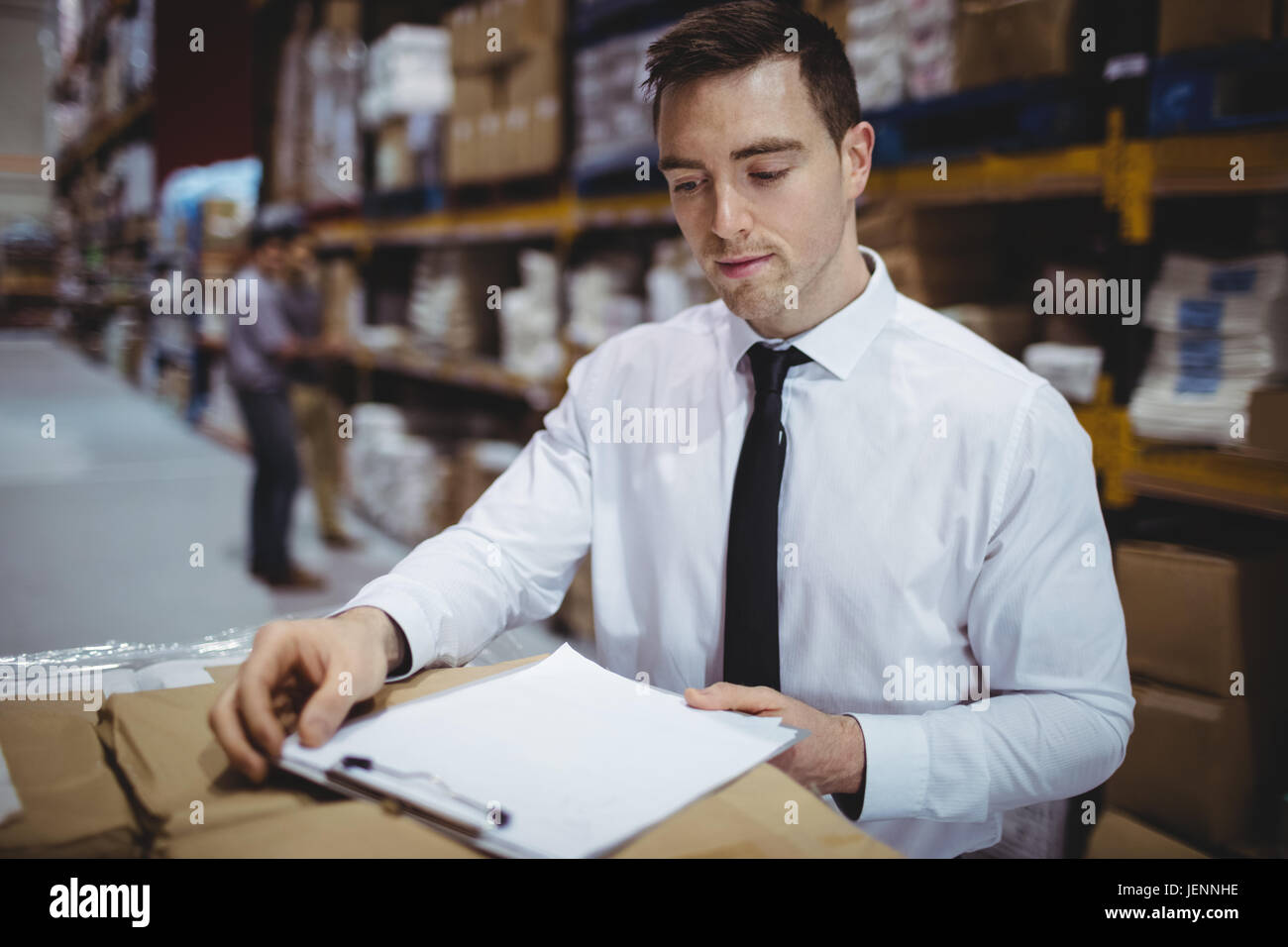 Warehouse manager distribution boxes hi-res stock photography and ...